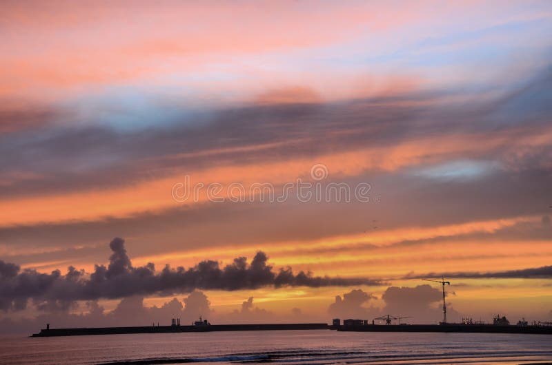 Harbor at sunset stock image. Image of water, crane, yellow - 30522125