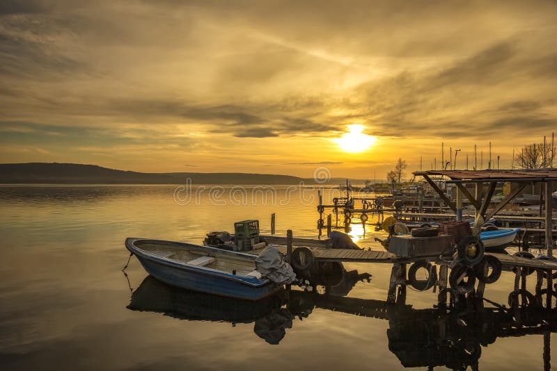At the Harbor with a Wooden Pier and Wooden Boat Stock Photo - Image of ...