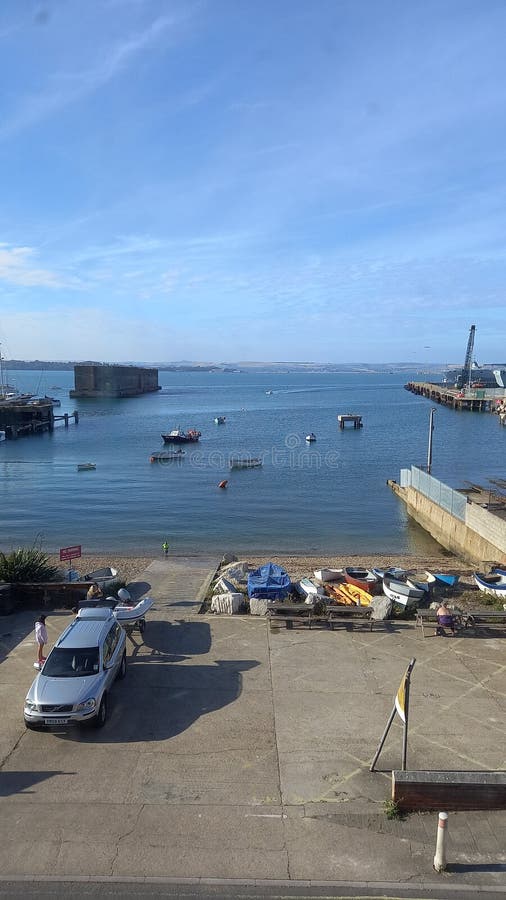 Harbour beach and slipway editorial stock photo. Image of reflection ...