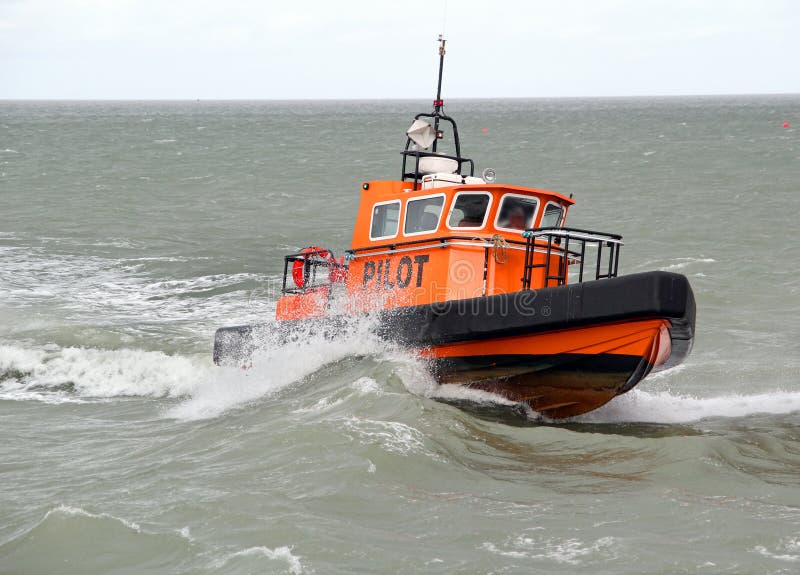 Orange tug/pilot boat stock photo. Image of tourism, cruise - 8112742
