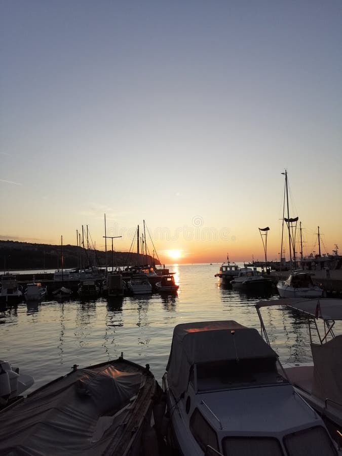 Harbour in the sunset editorial stock photo. Image of sunset - 158787878