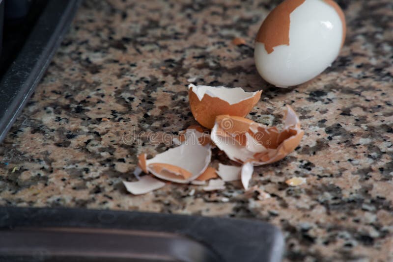 Hard Boiled Eggs with Shell beside on Granite Board Selective Focus ...