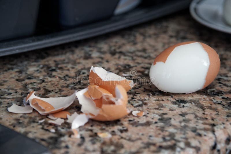 Hard Boiled Eggs with Shell beside on Granite Board Selective Focus ...