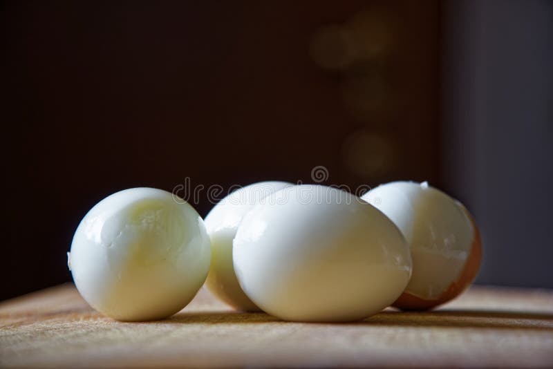 Hard Boiled Eggs with Shell beside on Granite Board Selective Focus ...