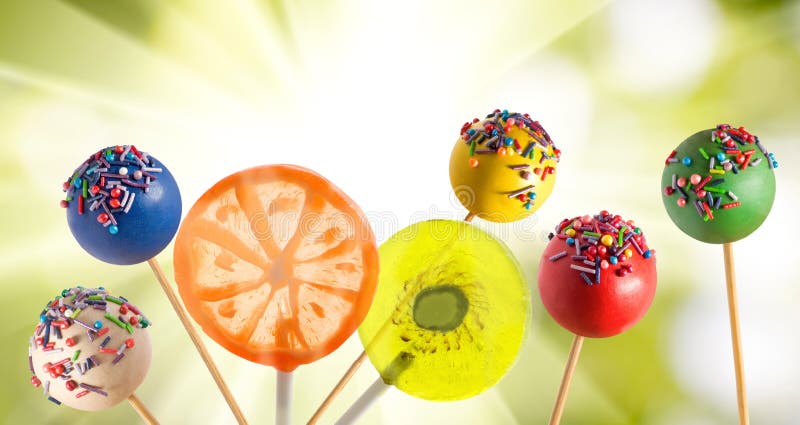 Hard Candies on Stick on Green Background Stock Image - Image of bright ...