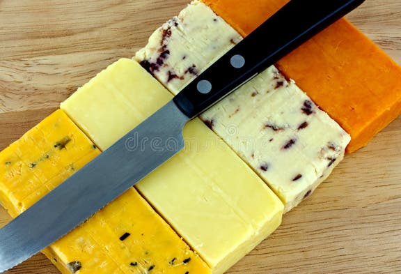 Four Types of Hard Cheese on a Wooden Board. Stock Photo - Image of ...