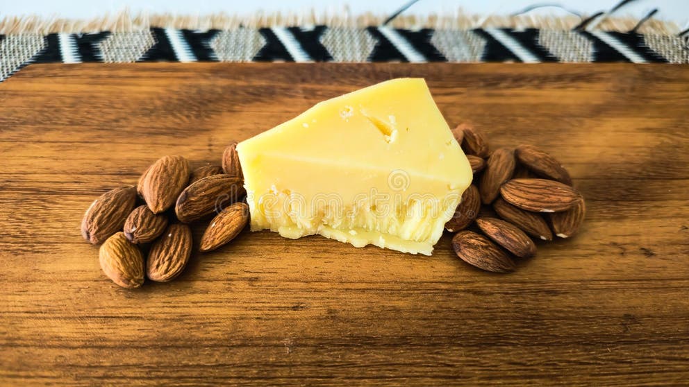 Hard Cheese and Almonds on Rustic Background Stock Photo - Image of ...