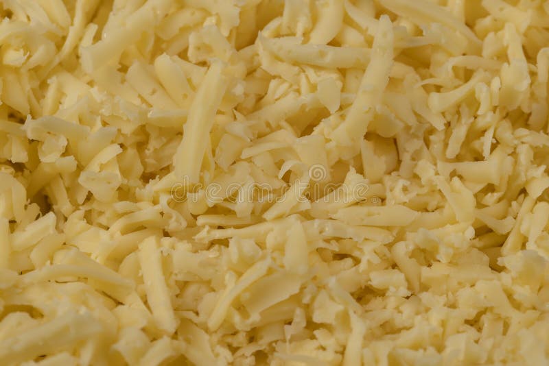 Hard Cheese with Holes Grated into Thin Small Slices Stock Image ...