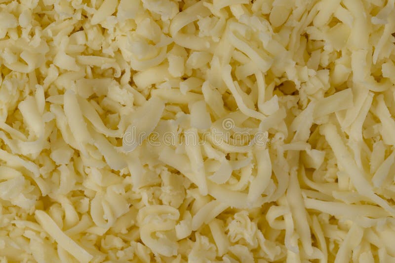 Hard Cheese with Holes Grated into Thin Small Slices Stock Photo ...