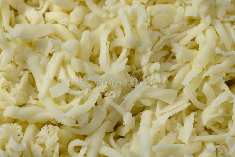 Hard Cheese with Holes Grated into Thin Small Slices Stock Image ...