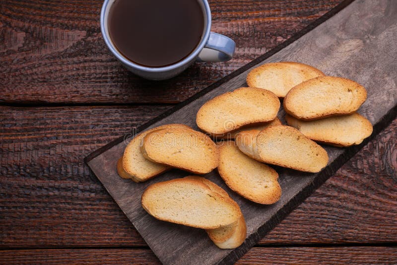 Hard Chuck Crackers and Cup of Tea on Wooden Table, Flat Lay Stock ...
