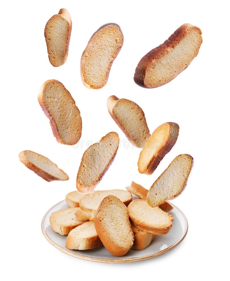 Hard Chuck Crackers Falling into Plate on White Background Stock Photo ...