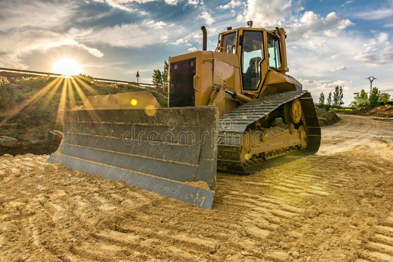 A Hard Day of Work in Road Construction with Heavy Machinery Stock ...