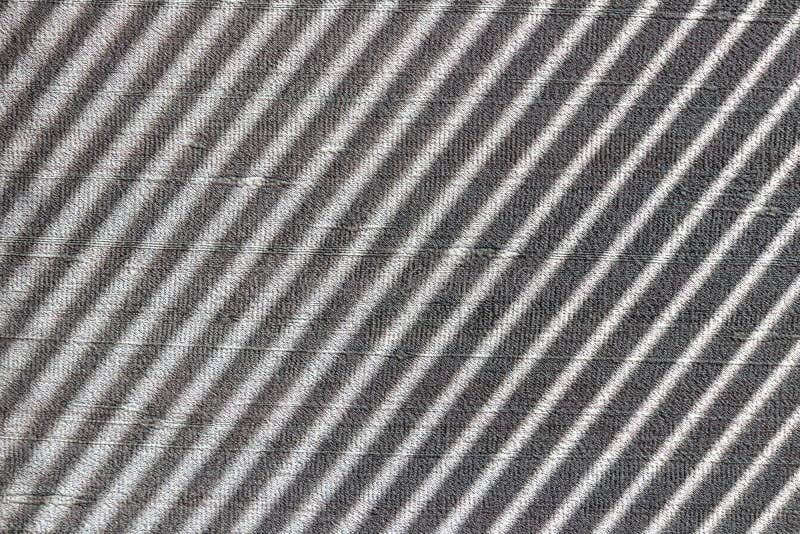 Hard Diagonal Shadows on Grey Textured Wall from a Window Roller ...