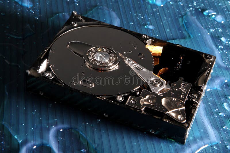 Hard Disk on a Blue Background Stock Photo - Image of hard, memory ...