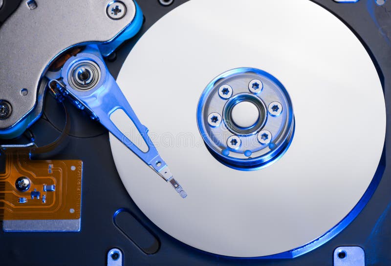 Hard Disk Drive in Blue Light Stock Photo - Image of indexing, internal ...