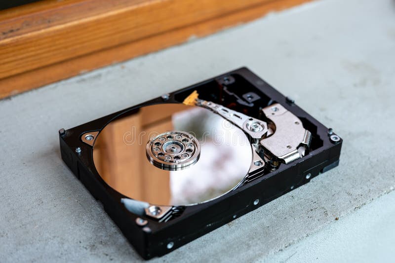 Hard Disk Drive on a Concrete Surface Stock Photo - Image of mirror ...