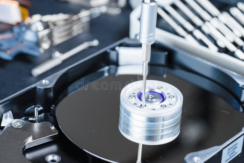 Disassembled Hard Disk Drive Inside Close-up, Spindle, Actuator Arm ...