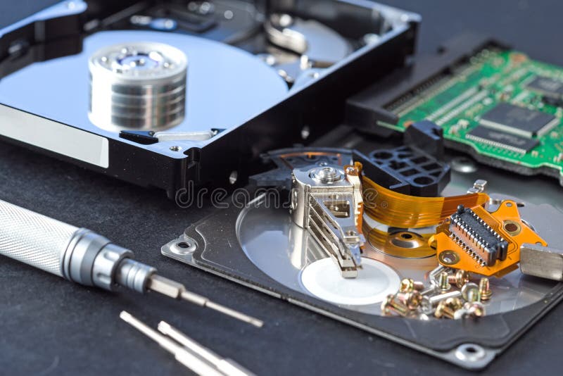 Disassembled Hard Disk Drive Inside Close-up, Spindle, Actuator Arm ...