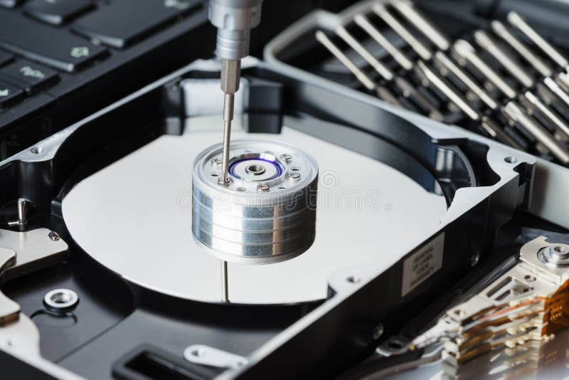 Disassembled Hard Disk Drive Inside Close-up, Spindle, Actuator Arm ...