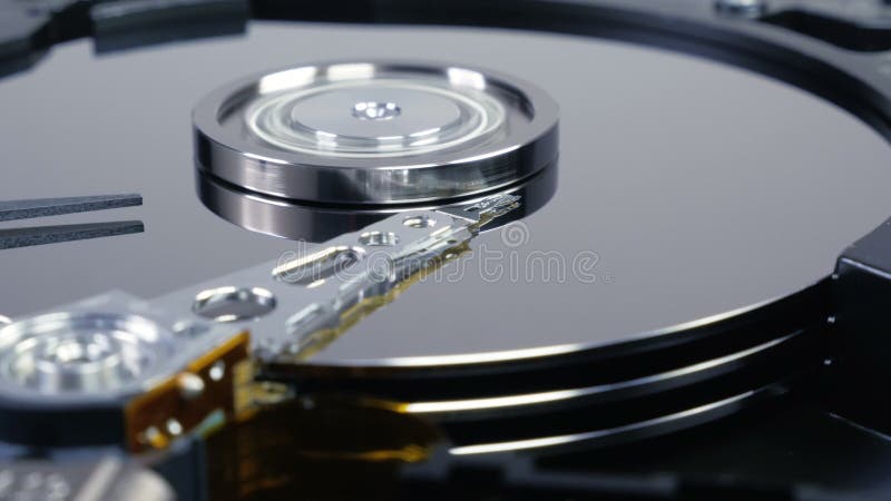Hard Disk Drive, Close Up of a Hard Disk Drive Reading and Writing Data ...