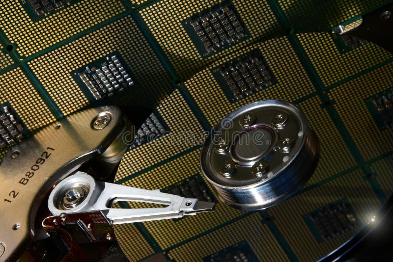 Hard Disk Drive Opened with Reflection of Processors on the Surface of ...