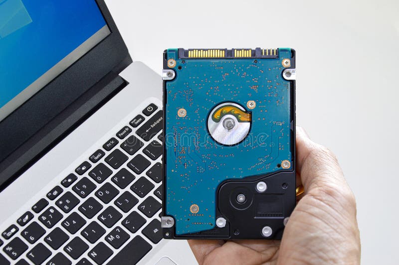 Hard Disk Drives are Still Widely Used, Hard Drives in Hand Stock Image ...