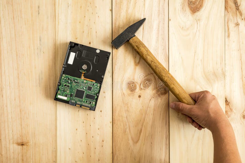 Hard Disk HDD and Hammer on the Hands Ready for Destruction Stock Photo ...