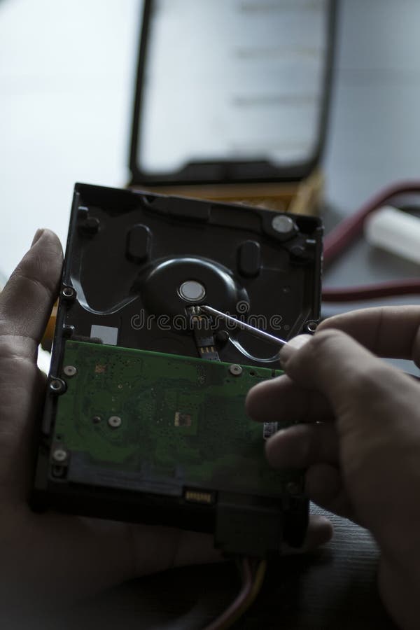 Hard disk repair stock image. Image of hand, drive, clean - 104872551