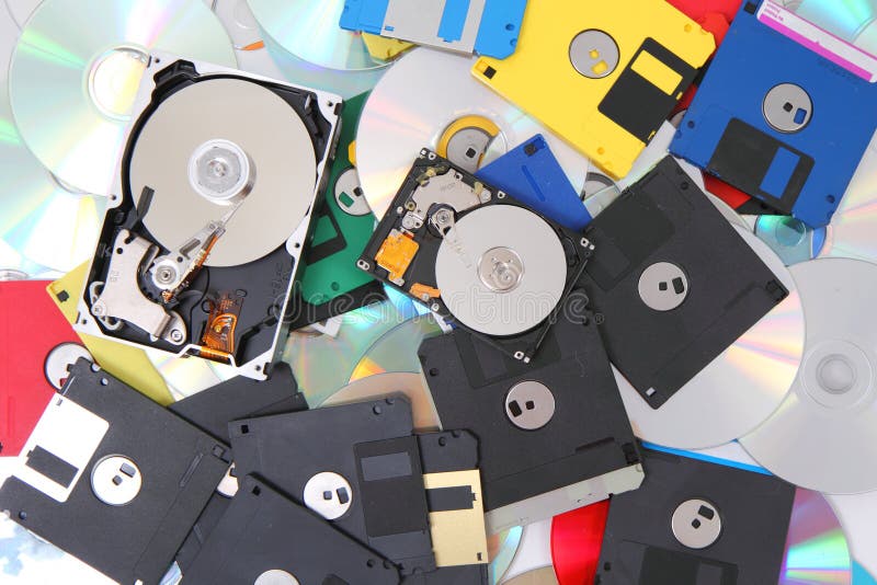 Old Opened Hard Disc on a Pile of Compact Discs Stock Photo - Image of ...