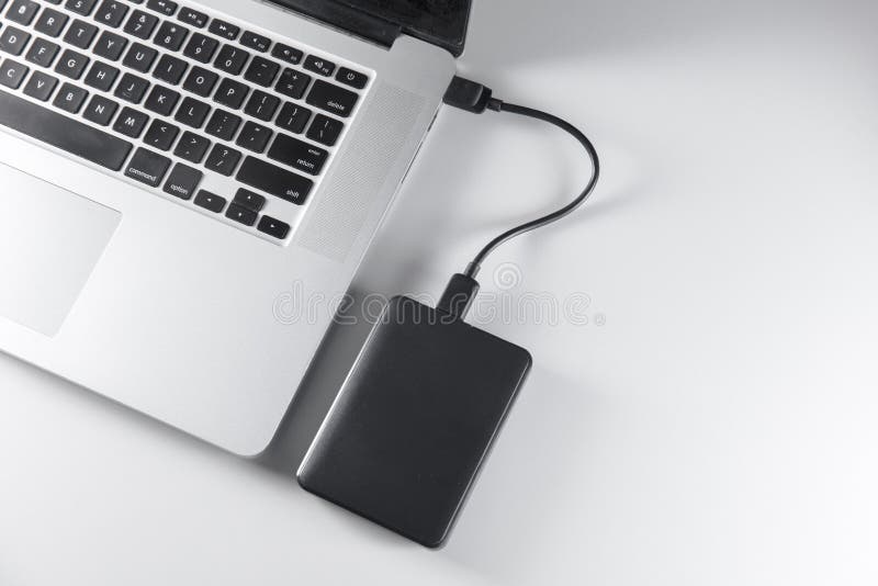 Hard drive and laptop stock photo. Image of keyboard - 183778908