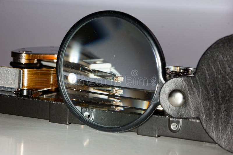 Hard Drive and Magnifying Glass, Representing the Process of Searching ...