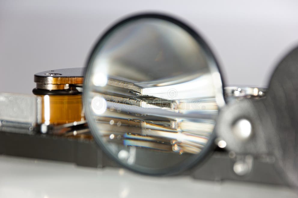 Hard Drive and Magnifying Glass, Representing the Process of Searching ...