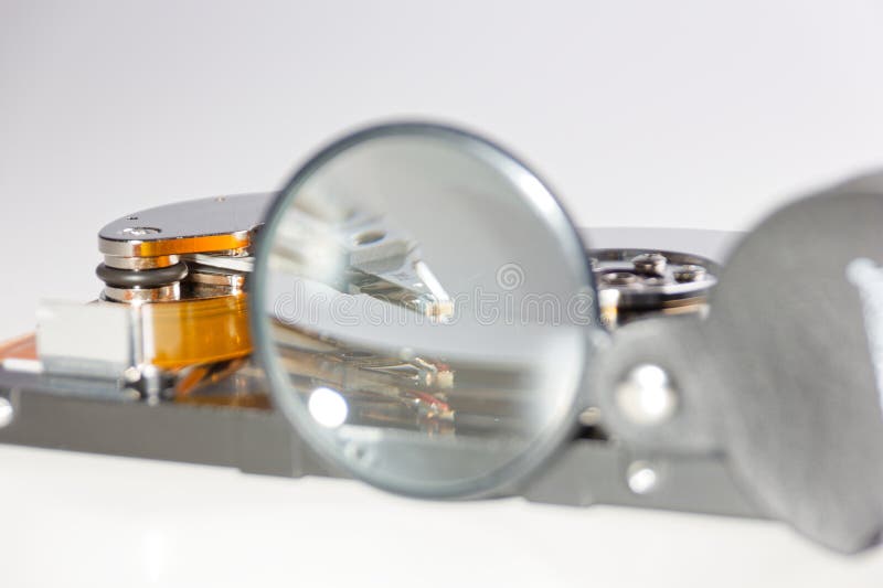 Hard Drive and Magnifying Glass, Representing the Process of Searching ...