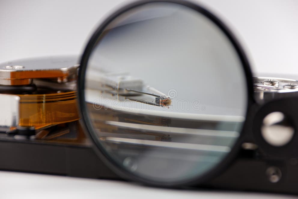 Hard Drive and Magnifying Glass, Representing the Process of Searching ...