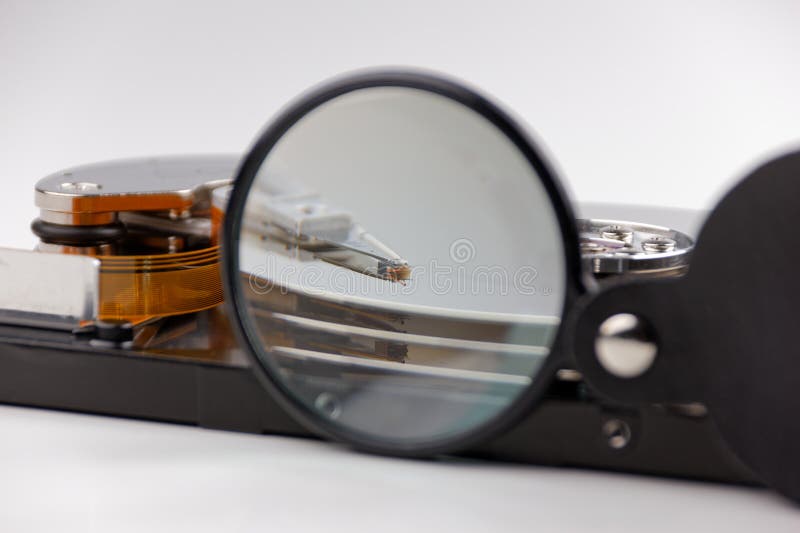 Hard Drive and Magnifying Glass, Representing the Process of Searching ...