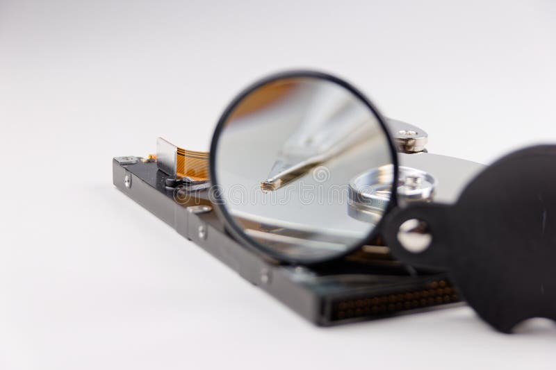 Hard Drive and Magnifying Glass, Representing the Process of Searching ...