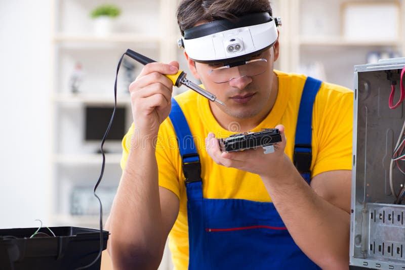 The Hard Drive Repair and Data Recovery Specialist Working in Lab Stock ...