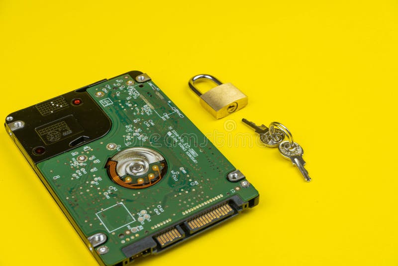 Hard Drive on a Yellow Background with a Lock and Keys Stock Image ...