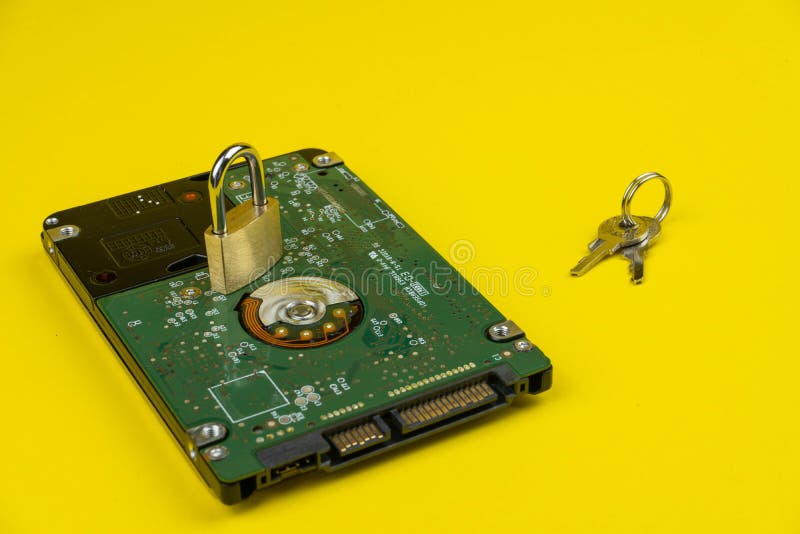 Hard Drive on a Yellow Background with a Lock and Keys Stock Image ...