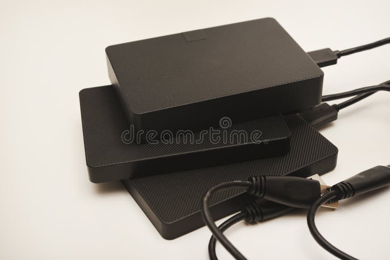 Hard Drives on a White Background. Modern Data Storage Devices with USB ...