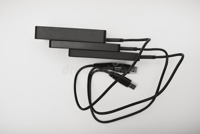 Hard Drives on a White Background. Modern Data Storage Devices with USB ...