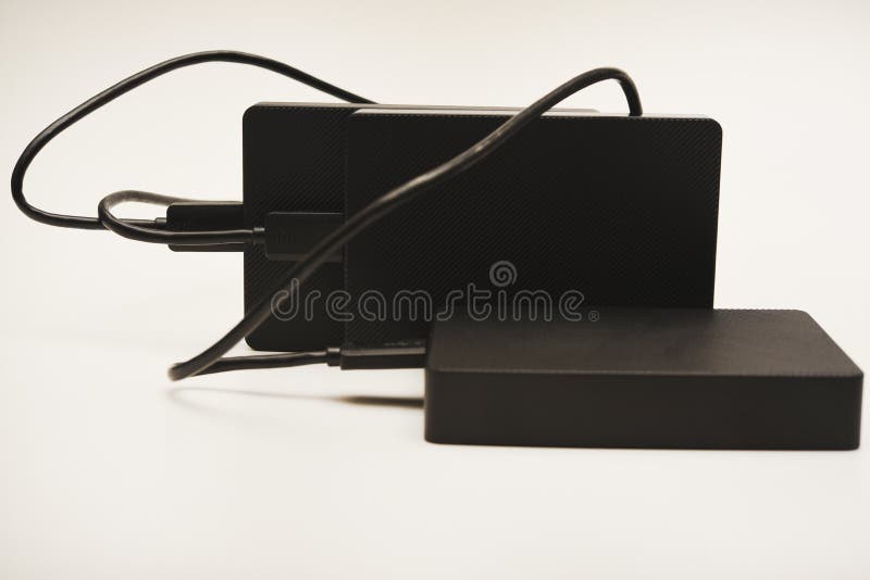 Hard Drives on a White Background. Modern Data Storage Devices with USB ...