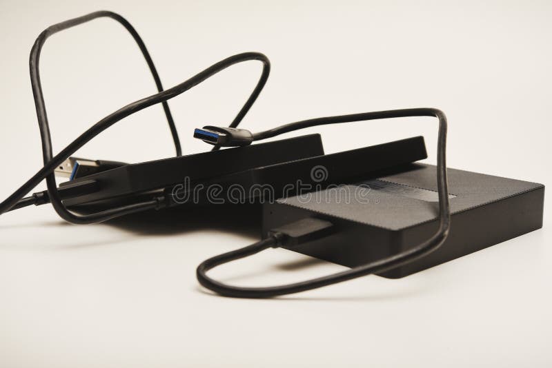 Hard Drives on a White Background. Modern Data Storage Devices with USB ...