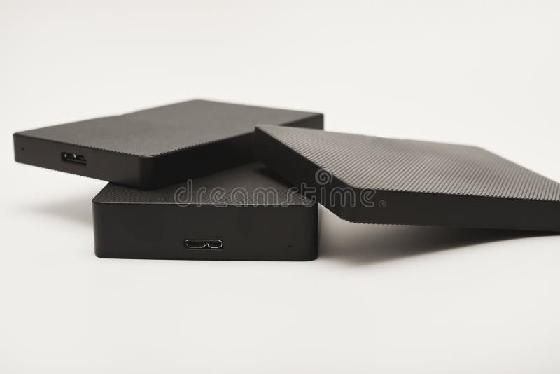 Hard Drives on a White Background. Modern Data Storage Devices with USB ...