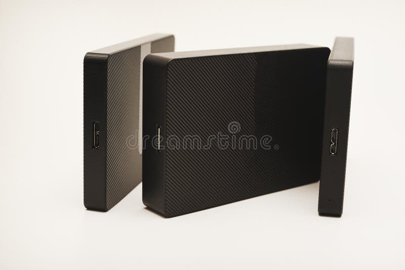 Hard Drives on a White Background. Modern Data Storage Devices with USB ...