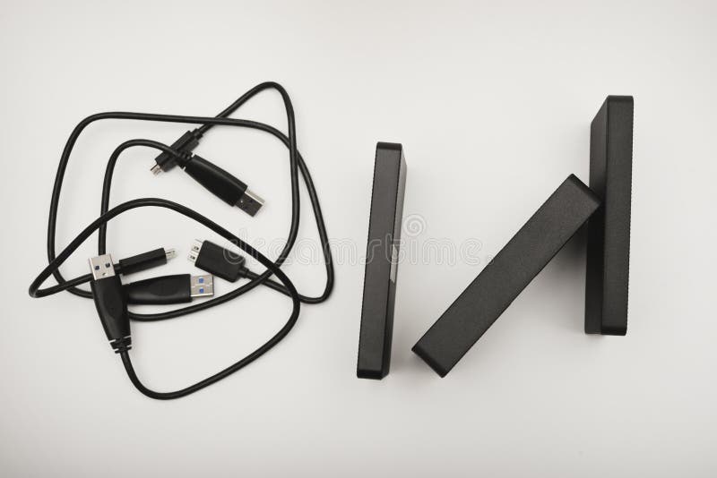 Hard Drives on a White Background. Modern Data Storage Devices with USB ...