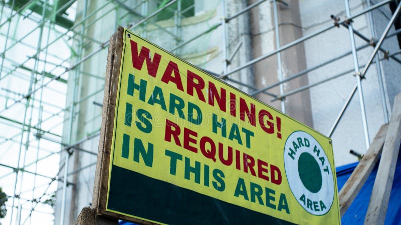 Hard Hat Warning Sign in Construction Area Stock Image - Image of ...