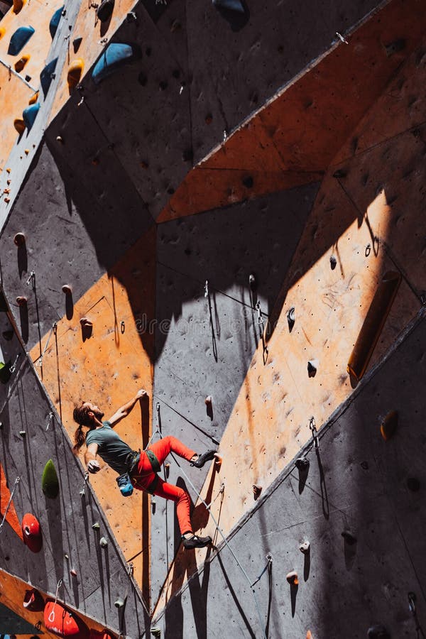 Hard Level. Young Man Professional Rock Climber Practicing at Training ...