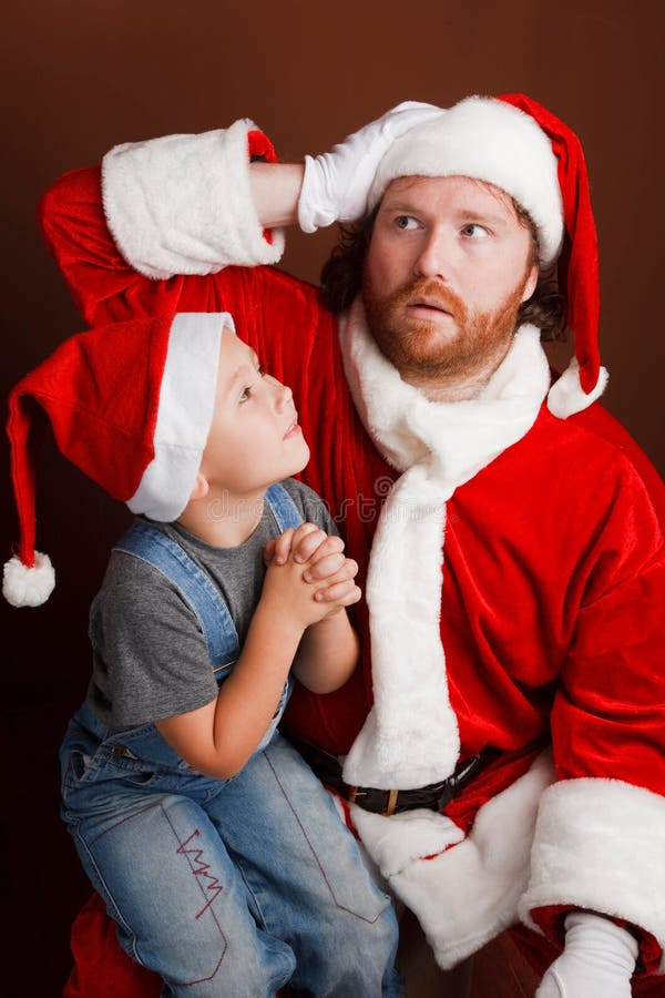 Hard Santas job stock photo. Image of horizontal, hold - 27772402